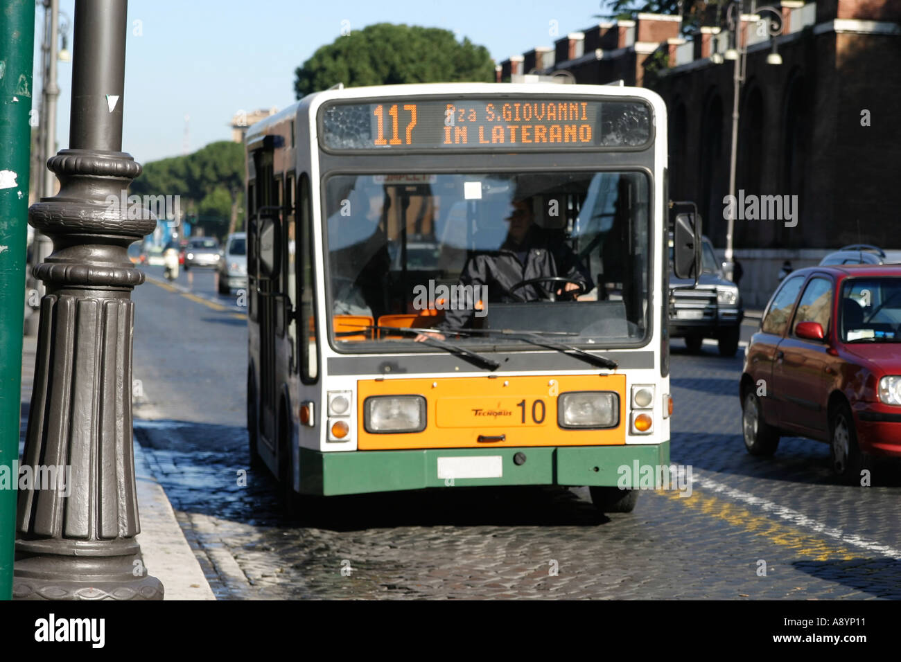 Public bus on roadway in italy Stock Photo - Alamy