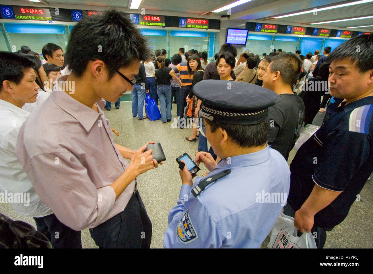 Chinese Authority Doing a Random ID Check Train Ticketing Windows ...
