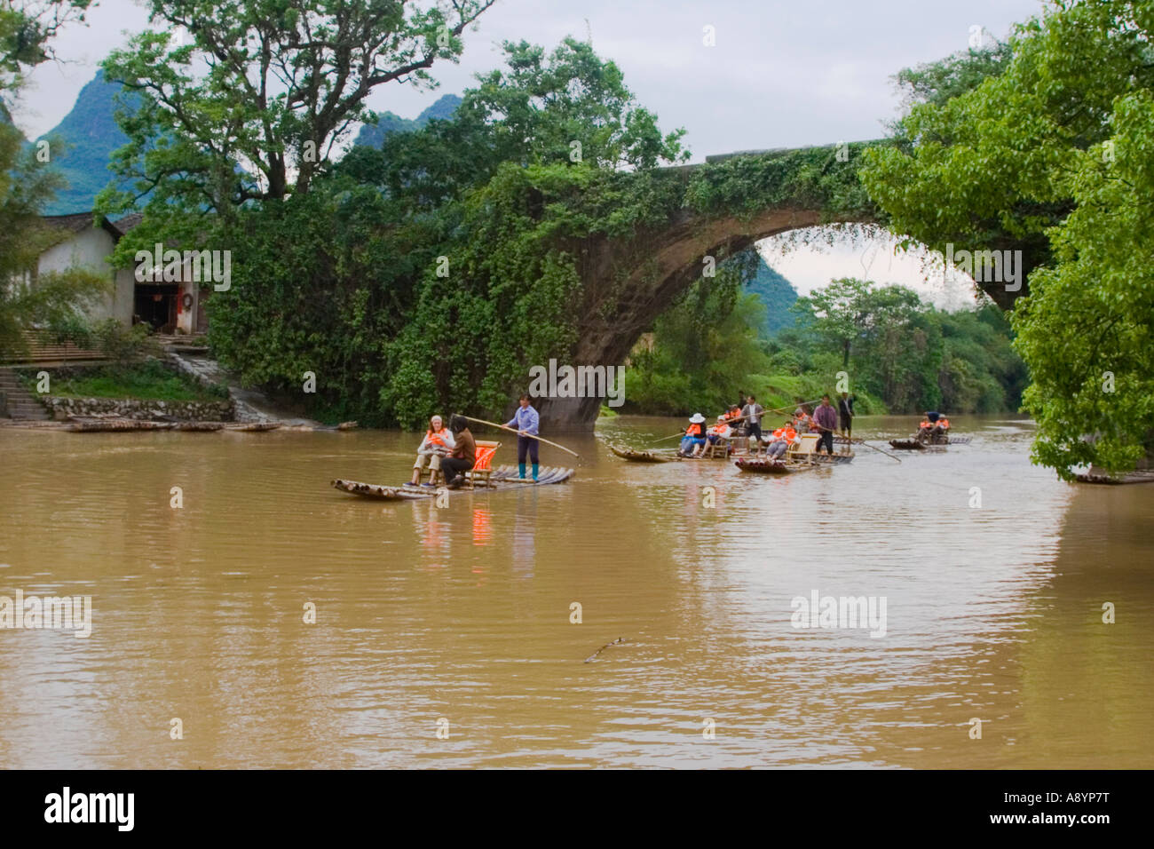 Tourists Raft Under the Old Yulong River Dragon Bridge Yangshuo China ...
