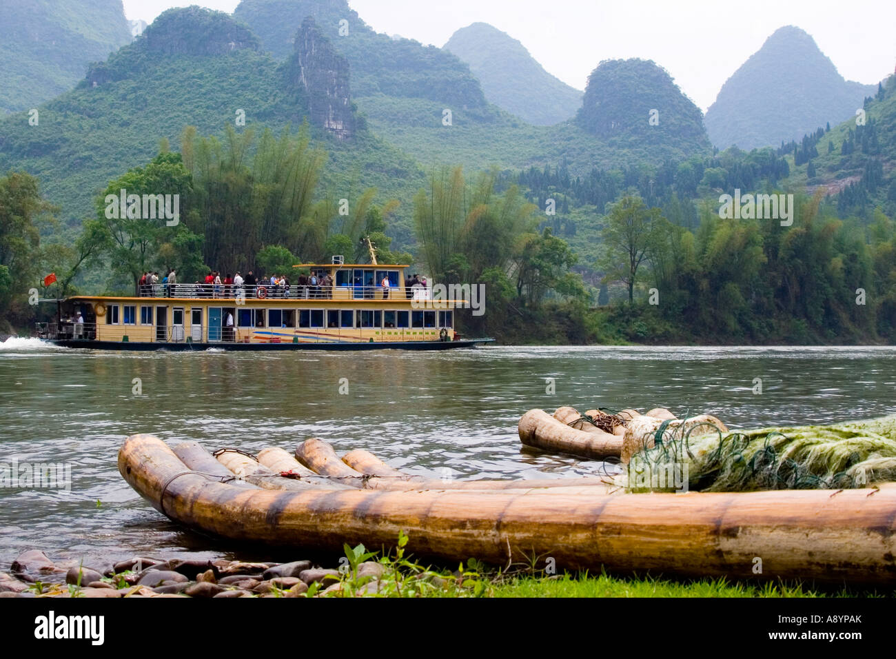 Bamboo Raft Tourist Passenger Cruise Passing through Limestone Karsts ...