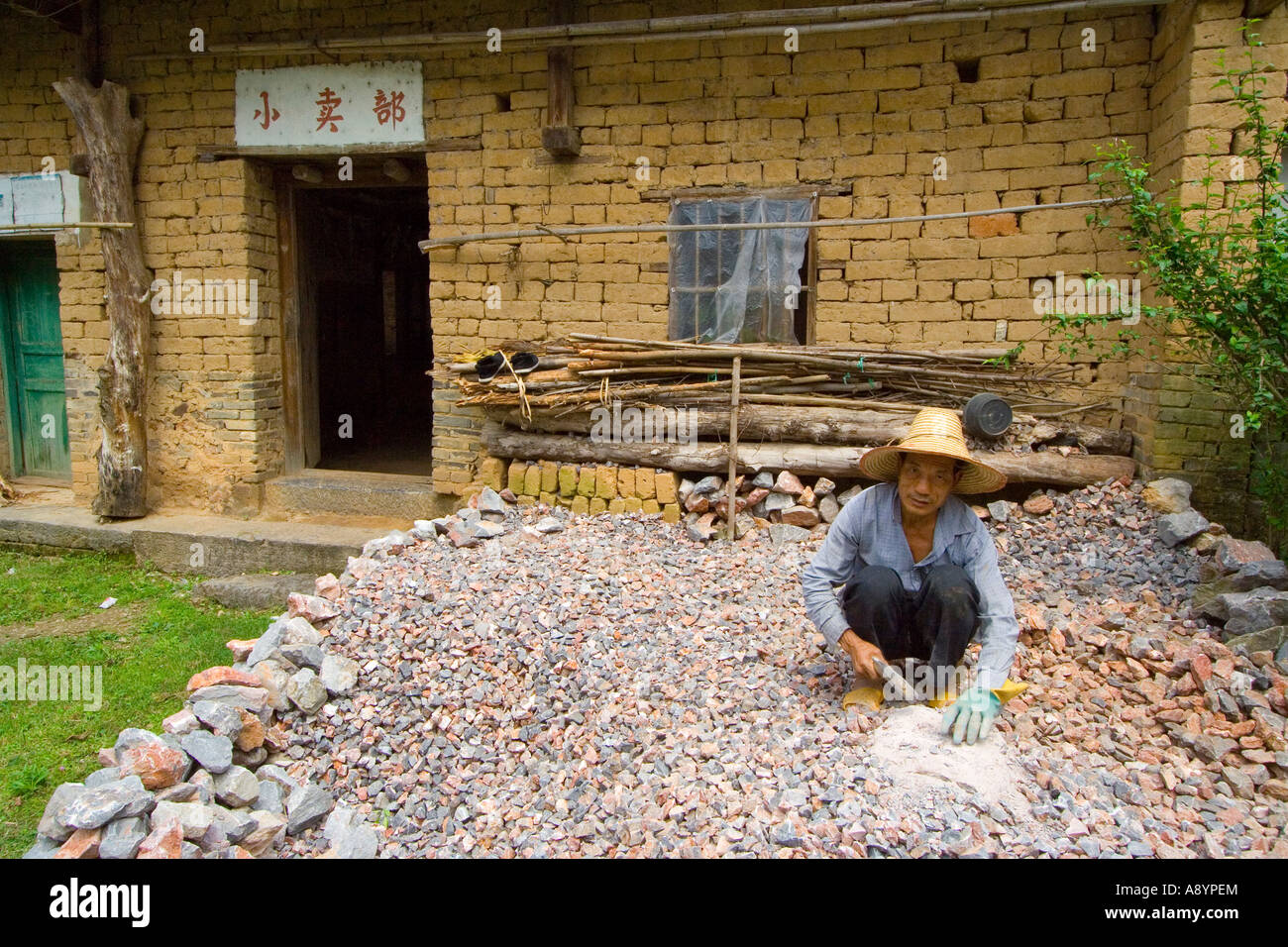 Chinese man breaking rocks hi-res stock photography and images - Alamy