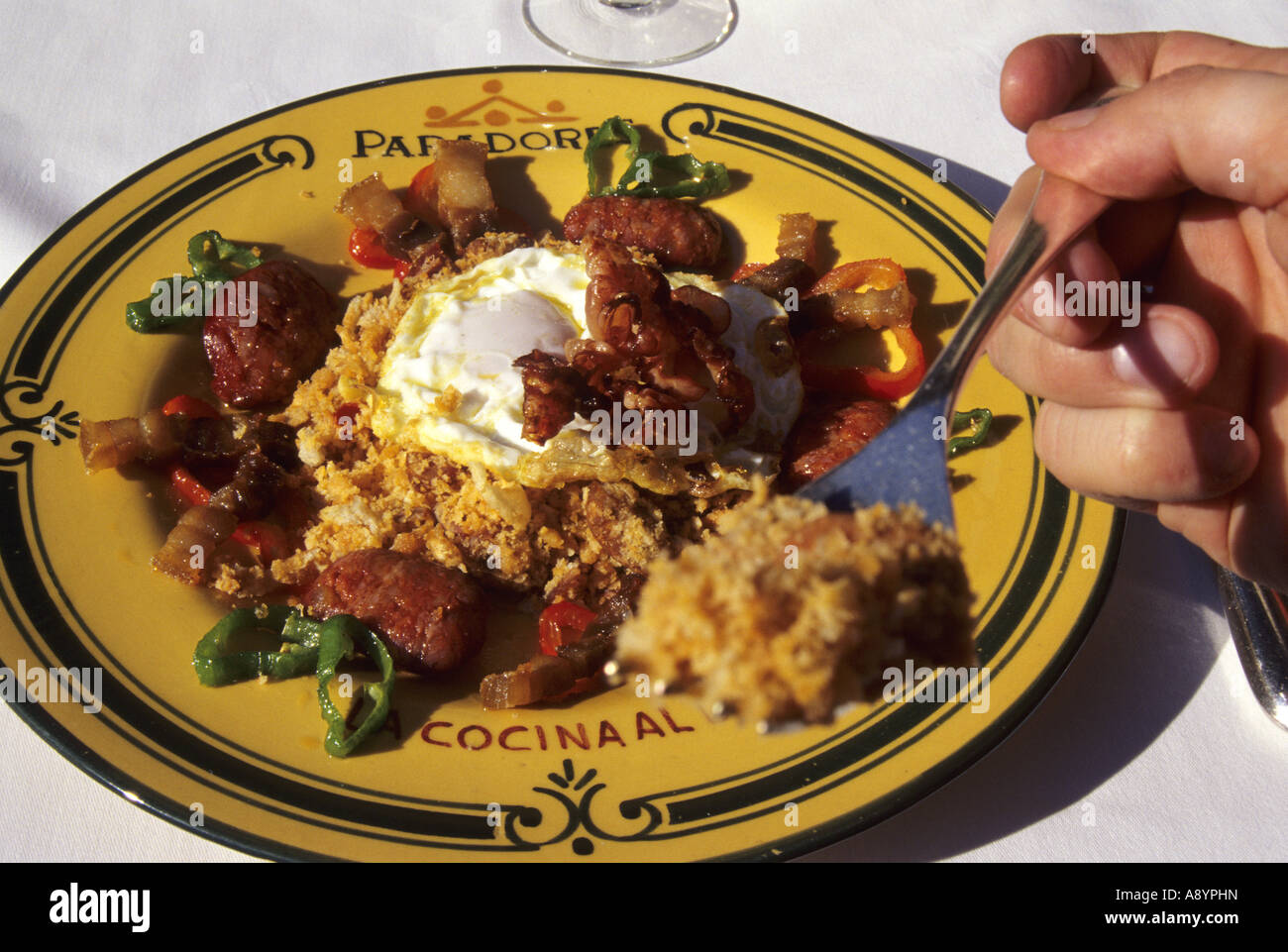 Migas bread in Extremadura style with fried egg Torreorgaz restaurant ...