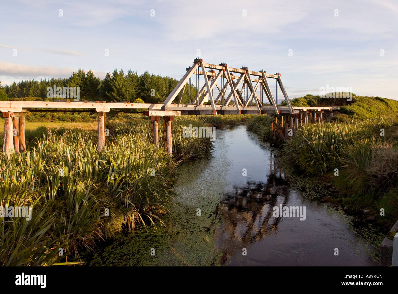 Historic truss rail bridge over Mahinapua Creek South of Hokitika New ...