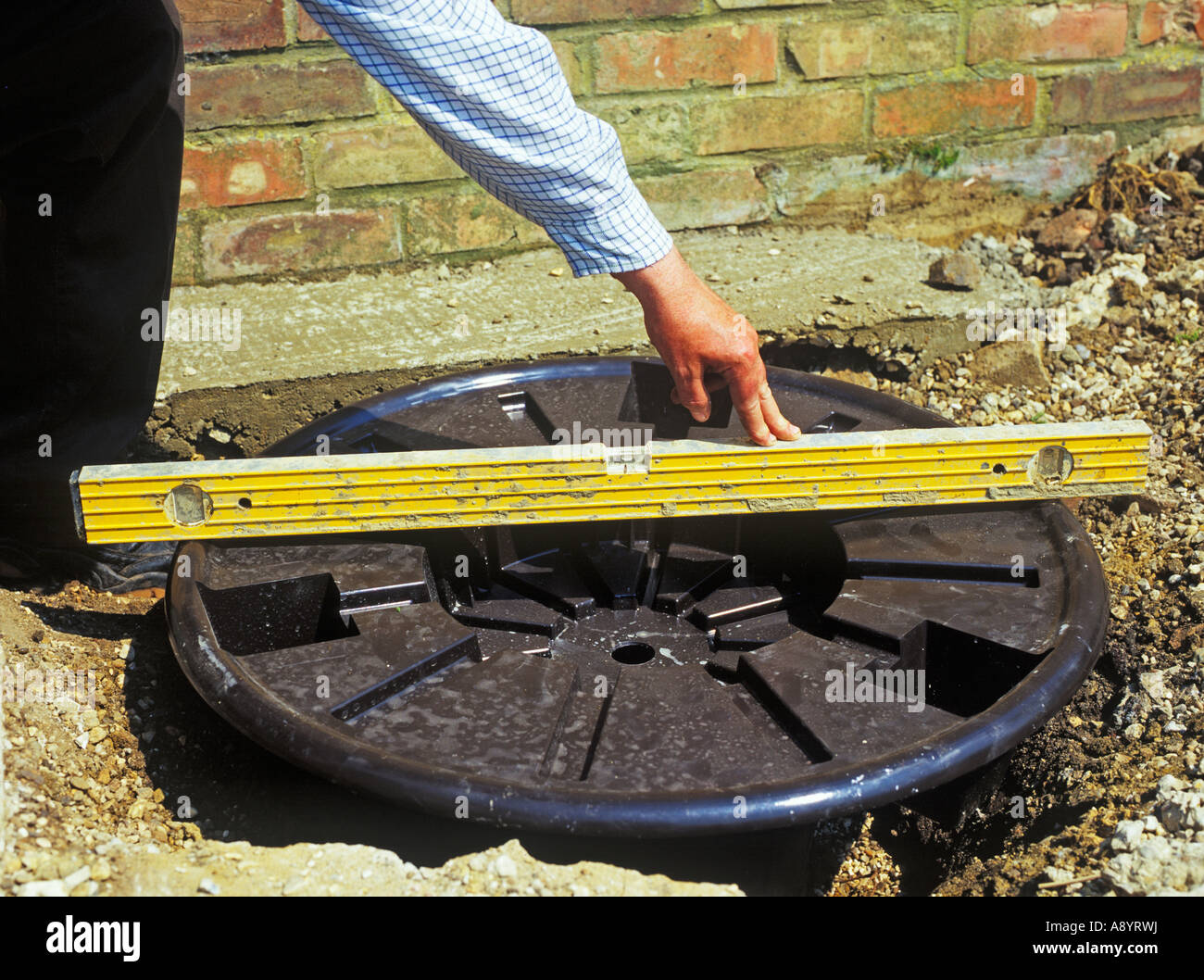 BUILDING A WALL FOUNTAIN STEP3 MAKING SURE THE RESERVIOR IS LEVEL Stock ...