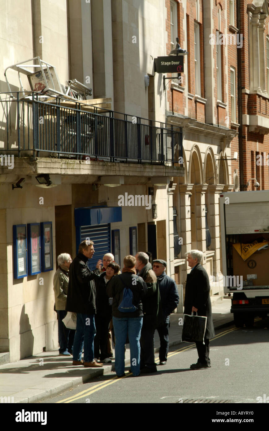 Stage, door, Johnnies, autograph, hunters, actor, talking to Stock ...