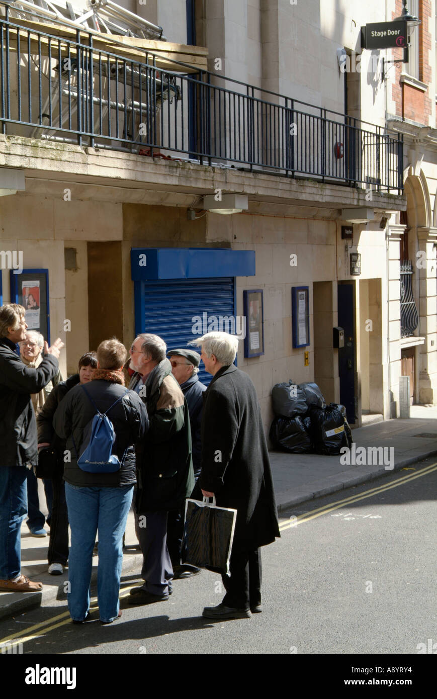 Stage, door, Johnnies, autograph, hunters, actor, talking to Stock ...