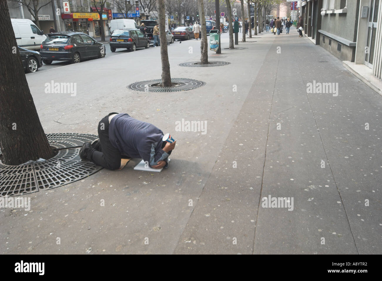 Man on knees beg hi-res stock photography and images - Alamy