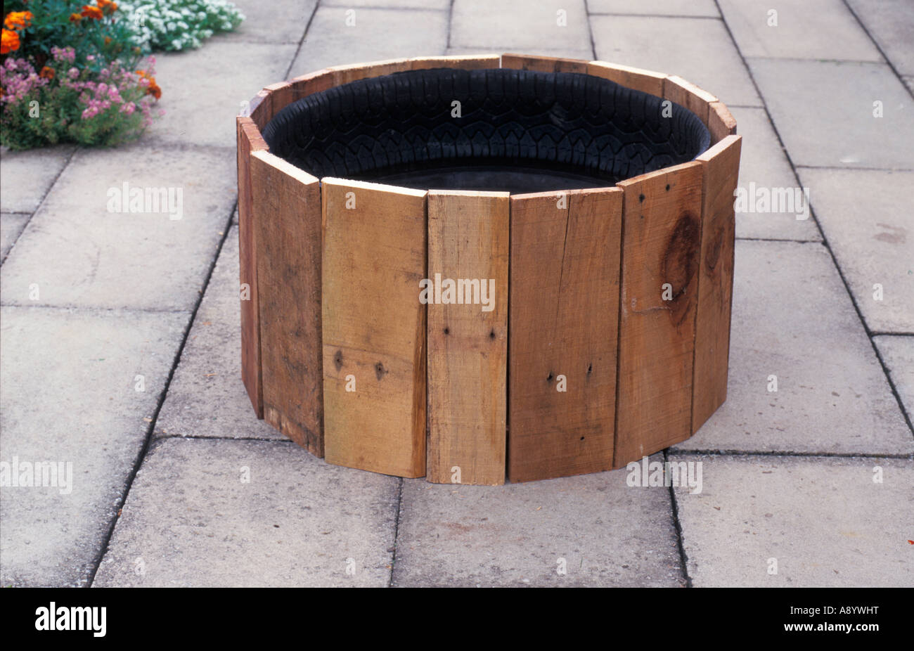 PLANTER MADE FROM TYRES AND PALLET WOOD STEP7 FITTING WOOD TO TYRES ...