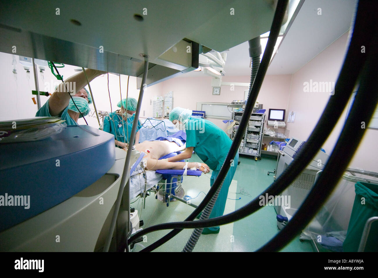 anesthesiologists preparing patient for cancer surgery operating room ...