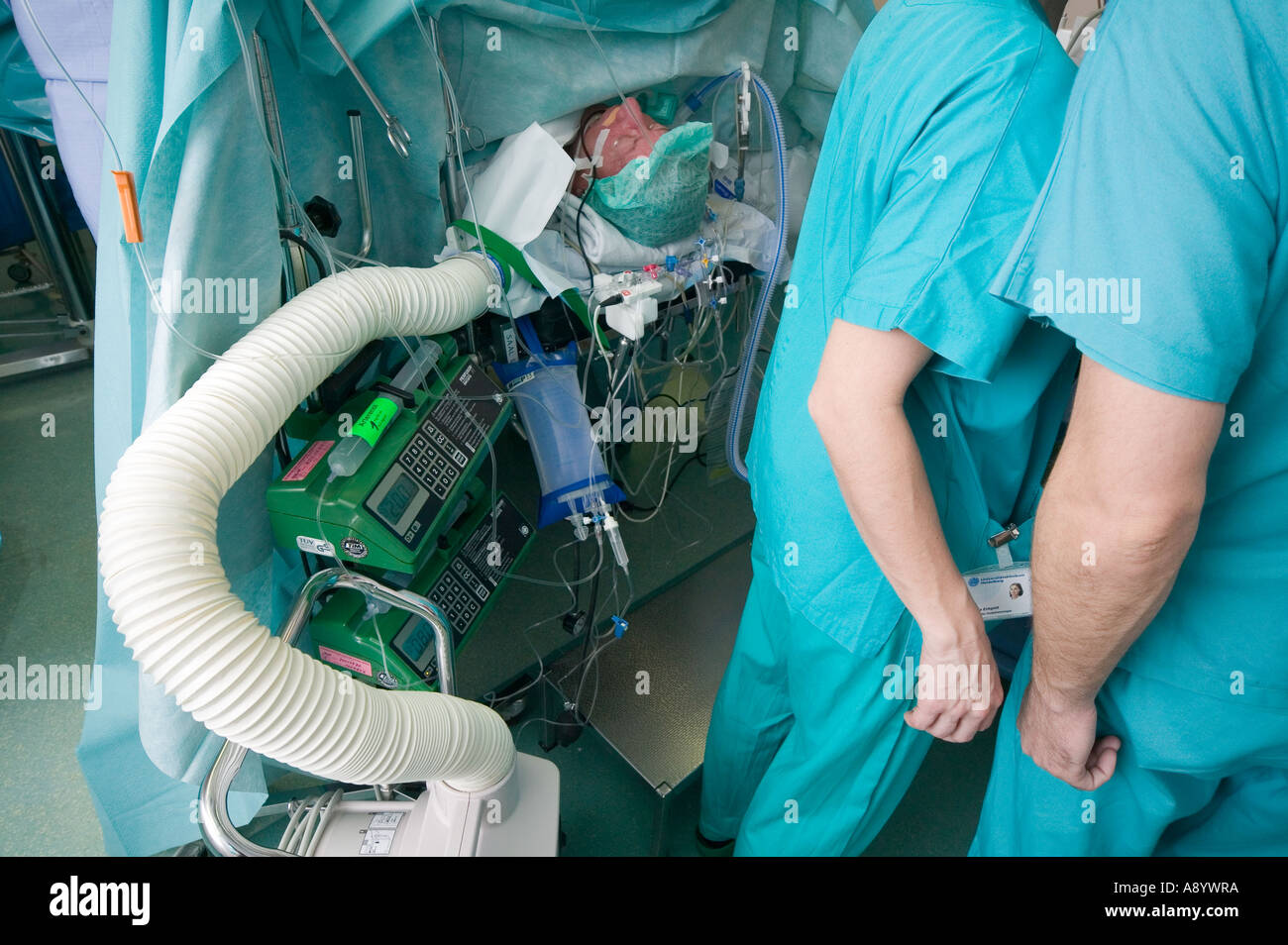 anesthesiologists preparing patient for cancer surgery operating room ...