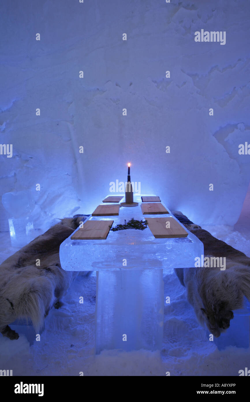 Dining table made of ice in dining room of an ice hotel Stock Photo - Alamy