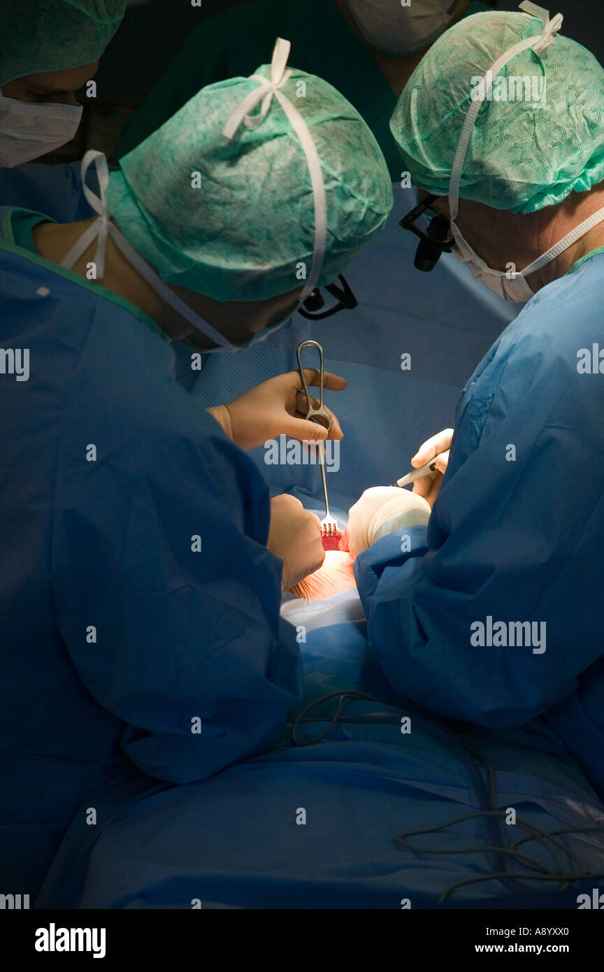 surgeon operating two month old baby patient heart surgery operating ...