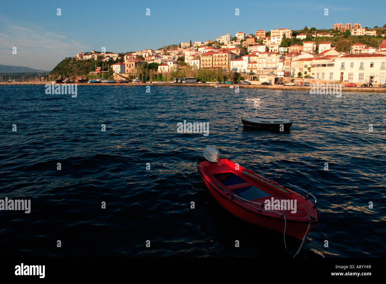 Red fishing boat in the harbor of Pylos Greece Stock Photo - Alamy