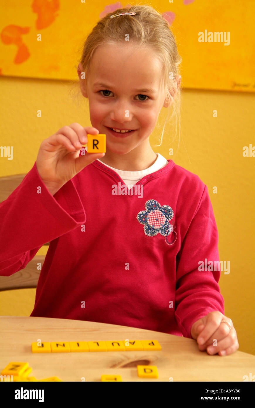 child puts words Stock Photo - Alamy