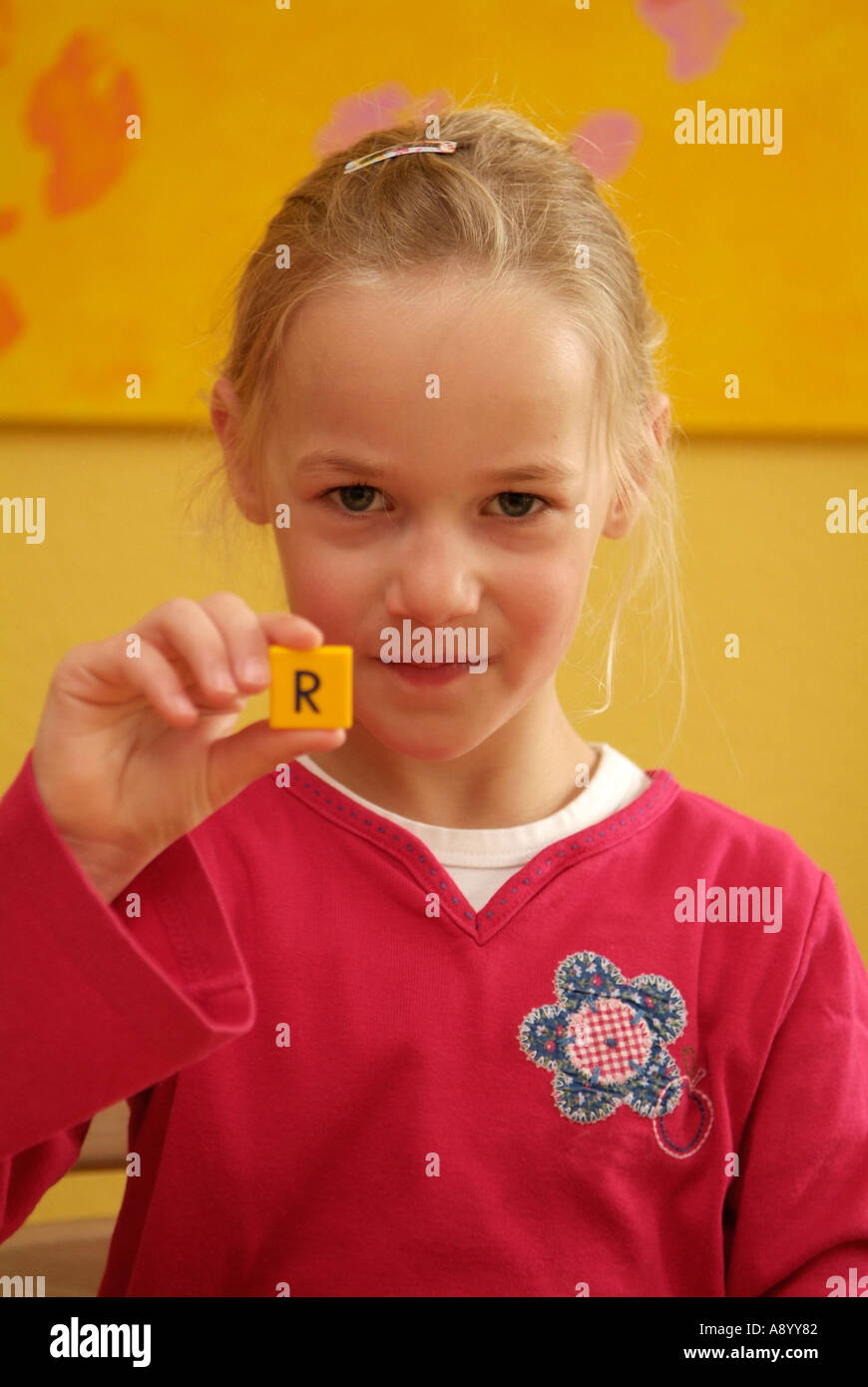child puts words Stock Photo - Alamy