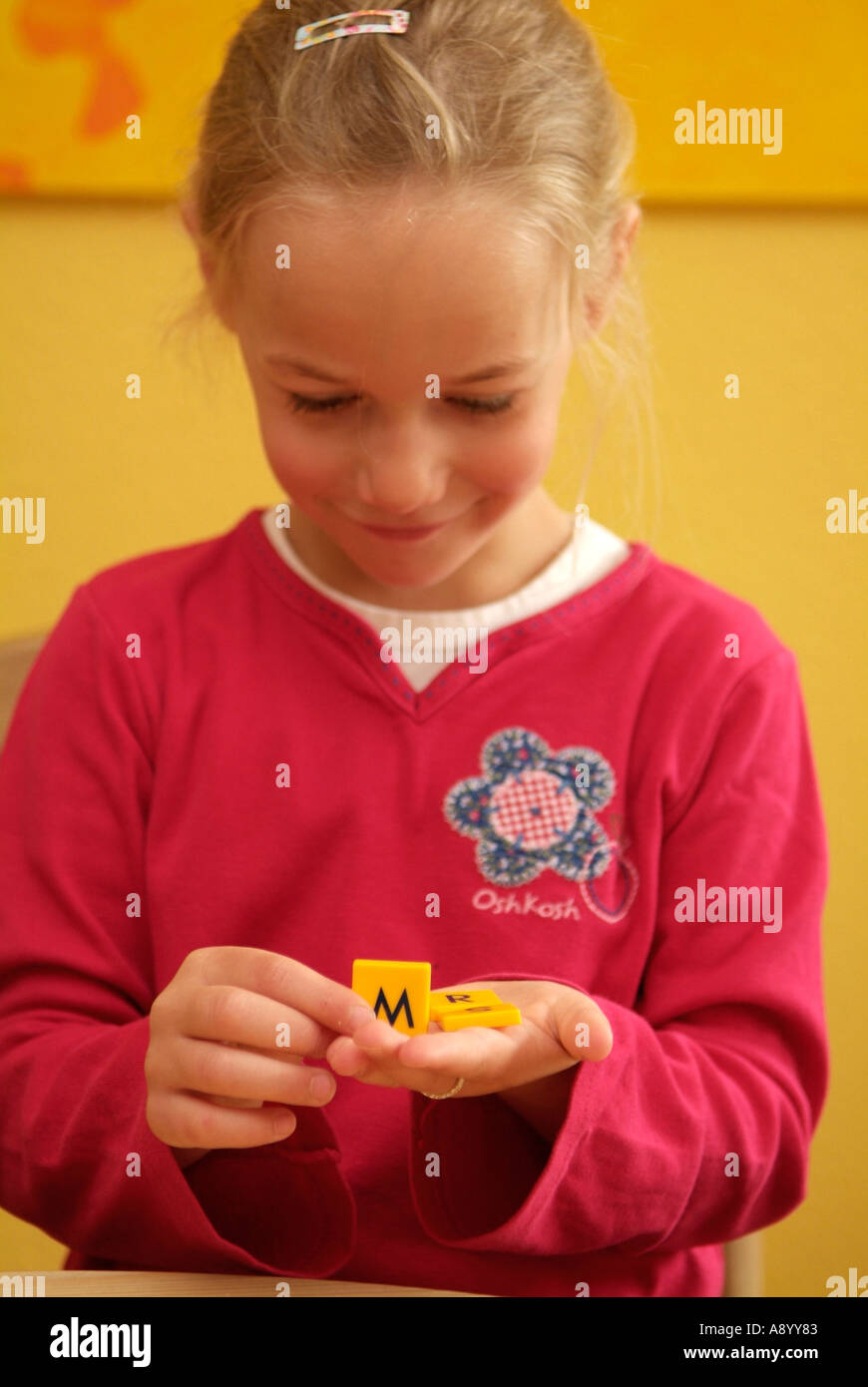 child puts words Stock Photo - Alamy