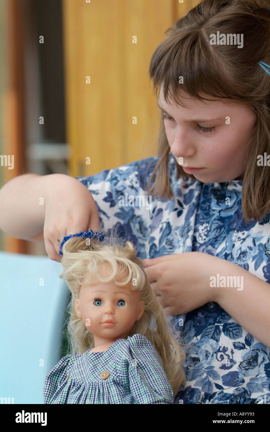 The girl with the doll hi-res stock photography and images - Alamy