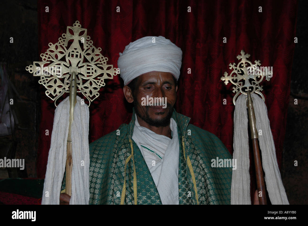 Priest dressed in cape hi-res stock photography and images - Alamy