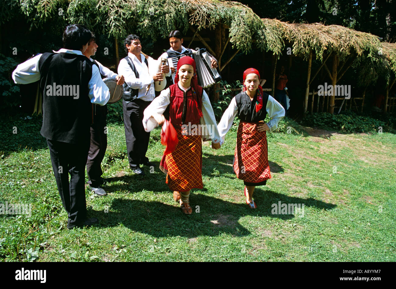 Two girls dancing, dressed in Bulgarian national costume, Chalin Valog ...