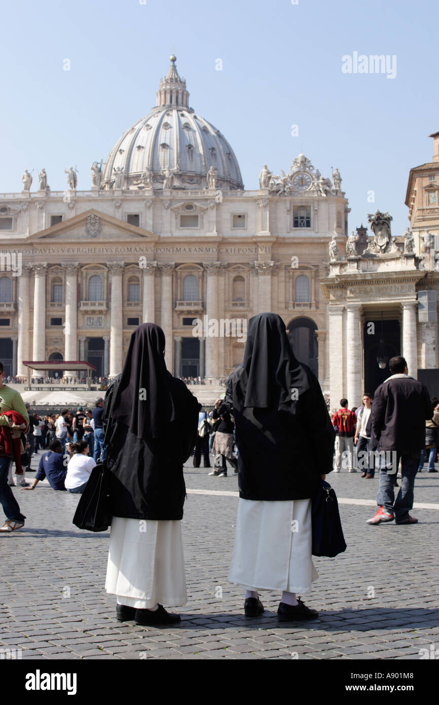 Nuns Look at St Peters Square and Basilica Vatican City Rome Italy ...