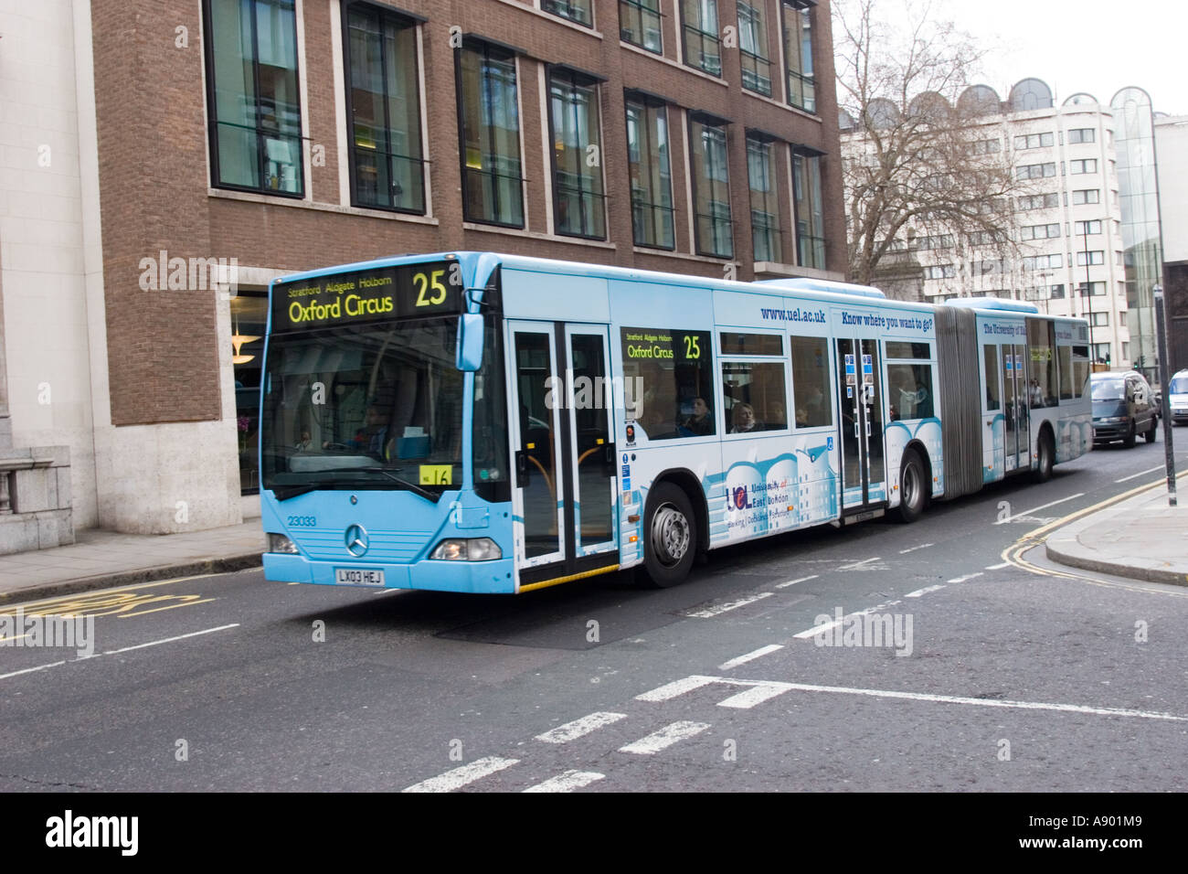 Blue london bendy bus in cheapside hi-res stock photography and images ...