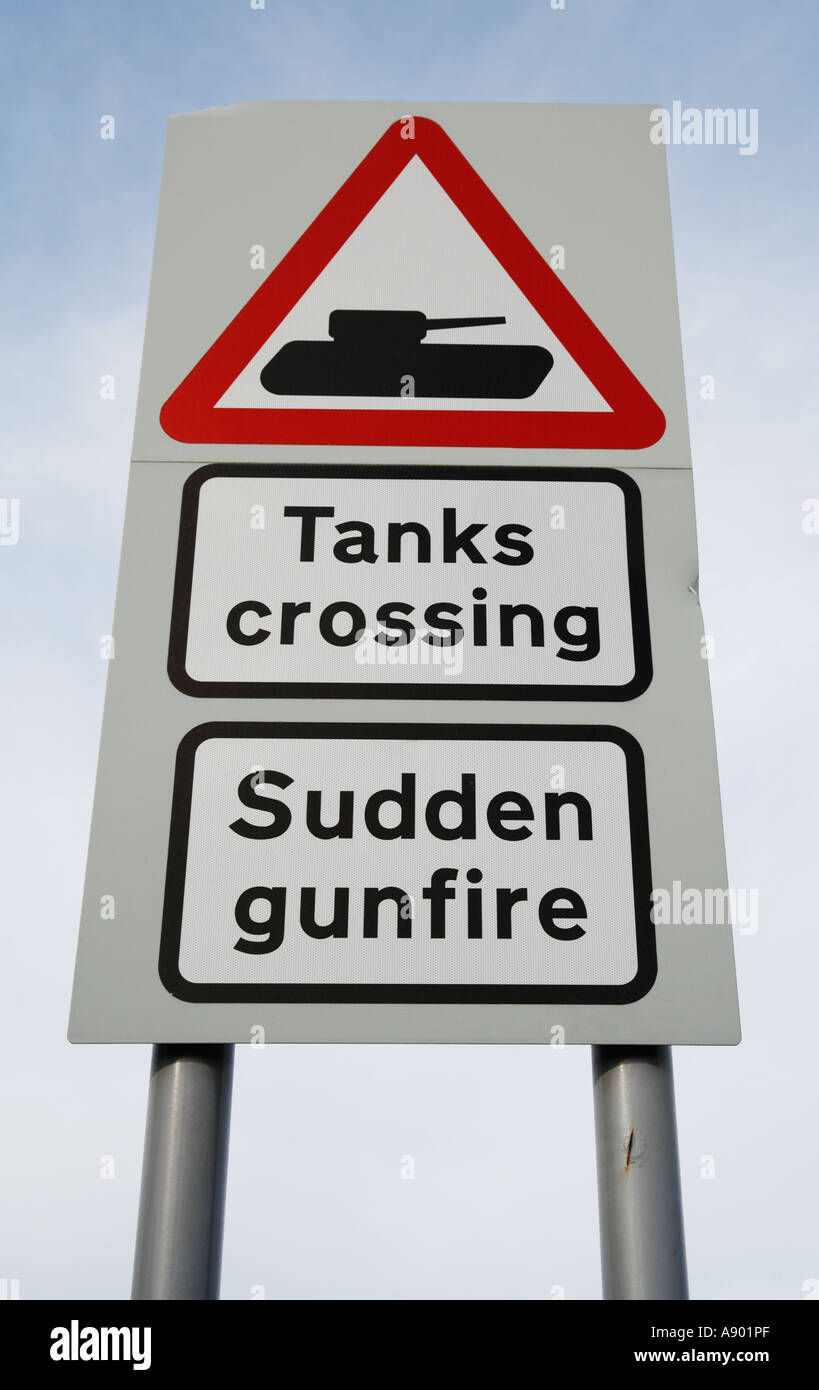 Sign warning of tanks crossing and sudden gunfire, Lulworth Ranges ...