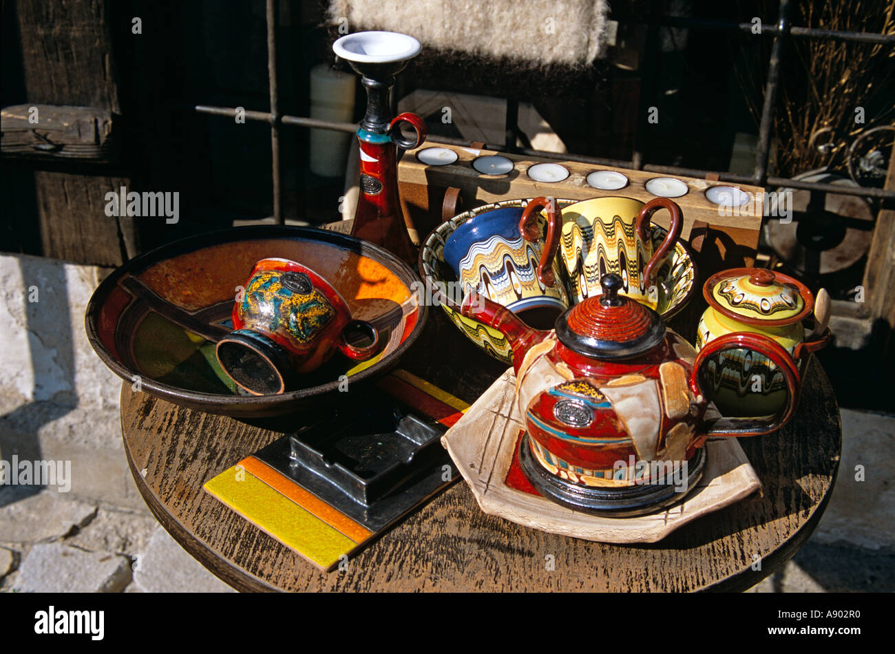 Traditional Bulgarian pottery on display outside gift and craft shop ...