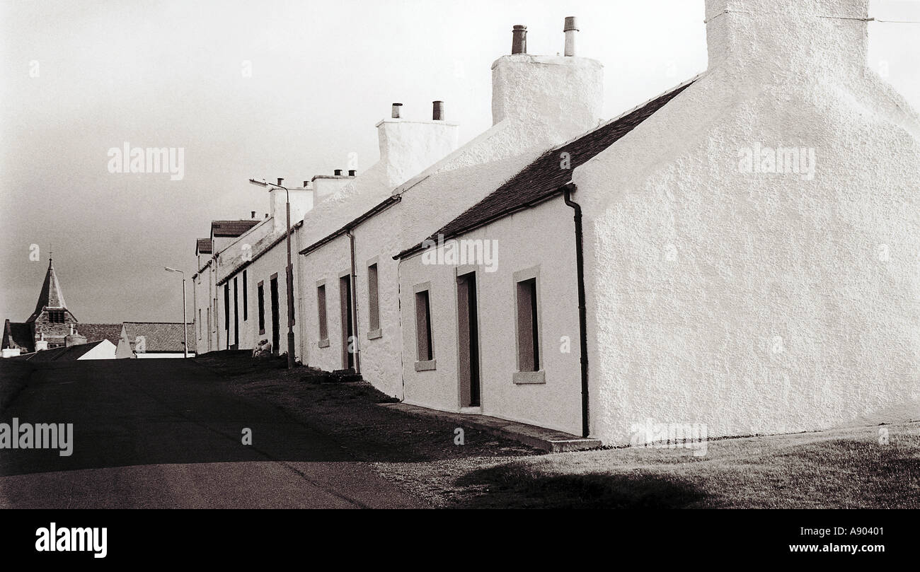Typical highland cottages in Port Ellen on the Hebridean island of ...