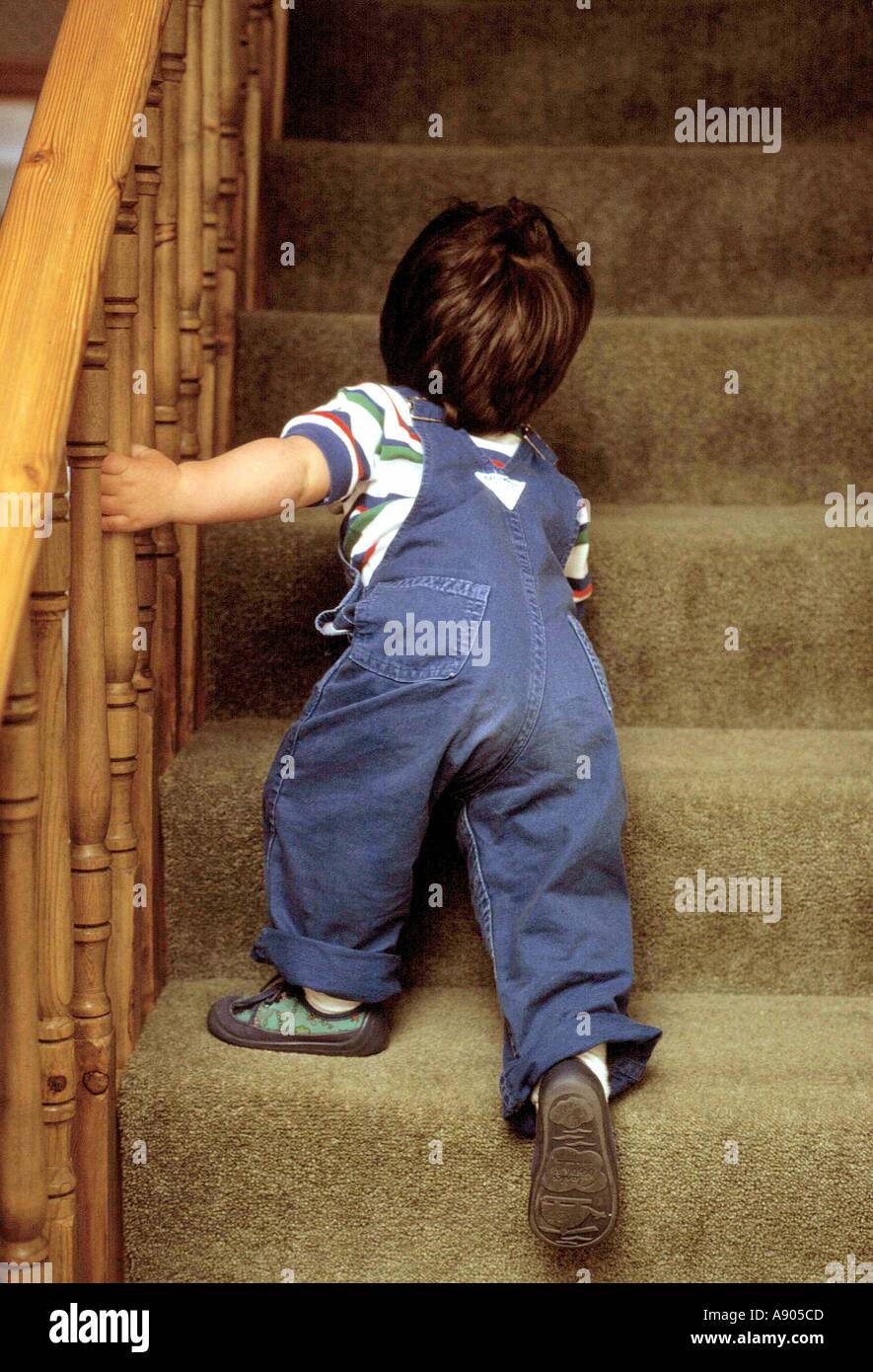Toddler climbing up stairs hi-res stock photography and images - Alamy