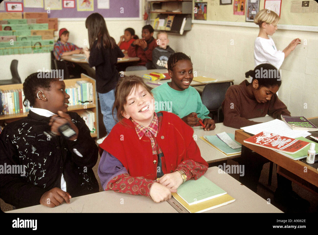 Junior school children in classroom Stock Photo - Alamy