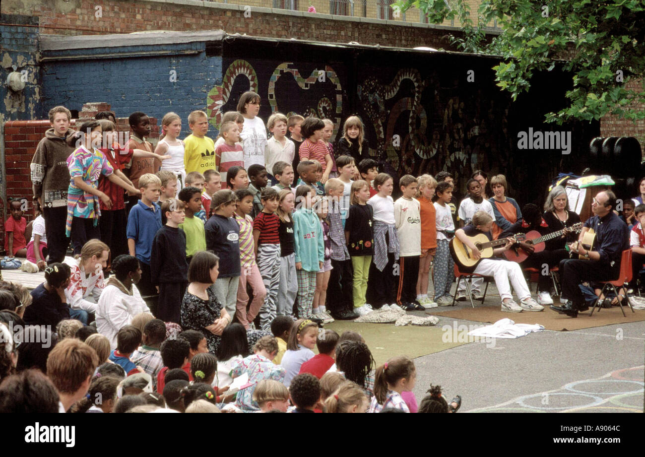School Fair with children singing Stock Photo - Alamy