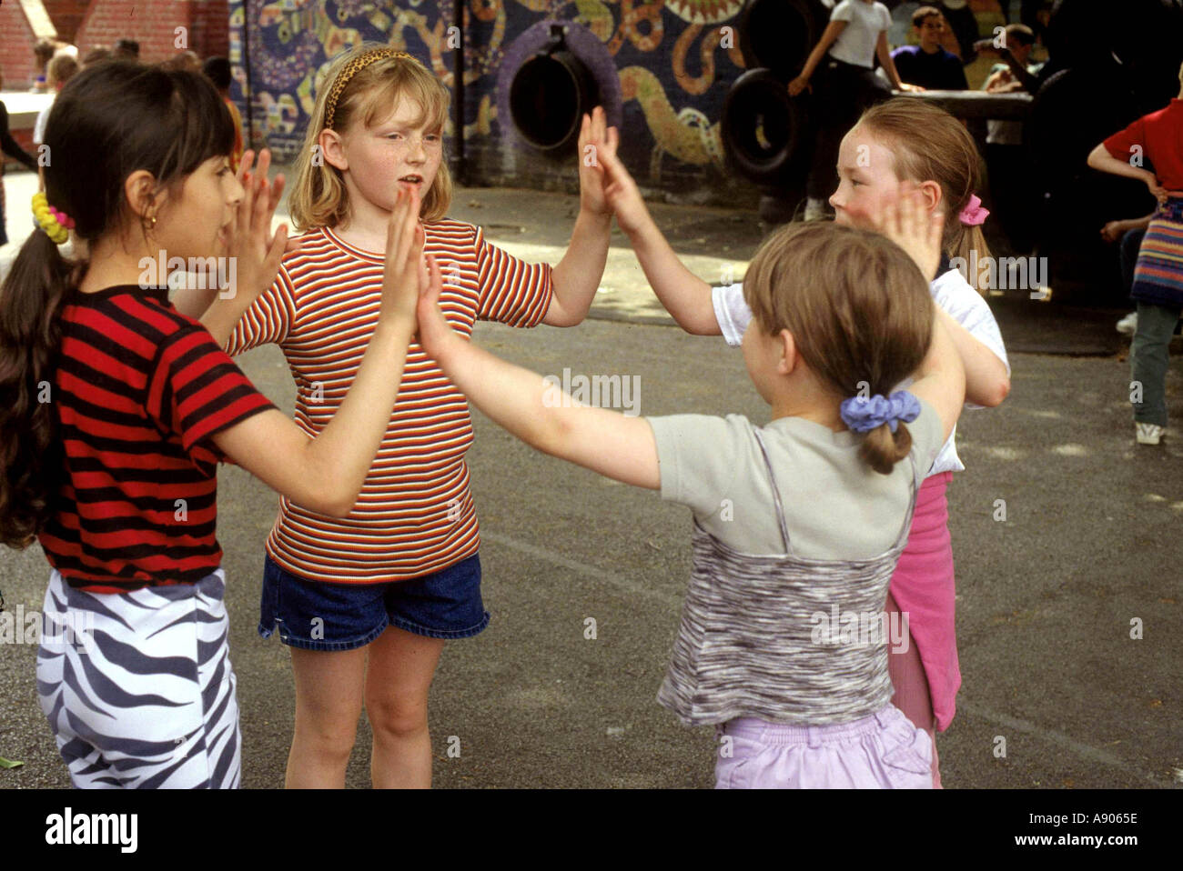 School girls playing in playground hi-res stock photography and images ...