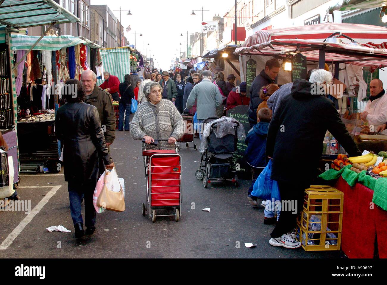 People shopping in street market Stock Photo - Alamy