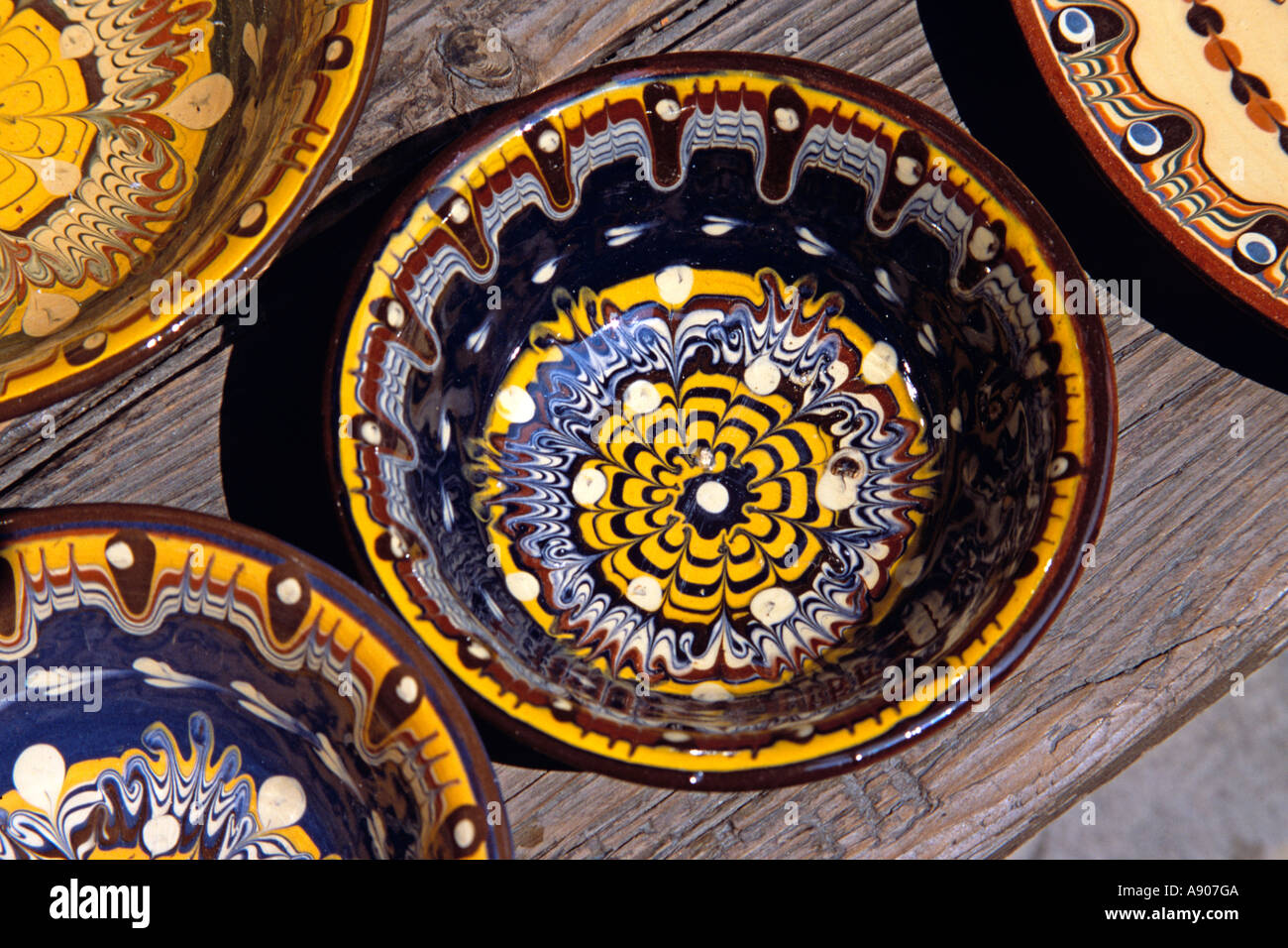 Traditional Bulgarian pottery on display outside gift and craft shop ...