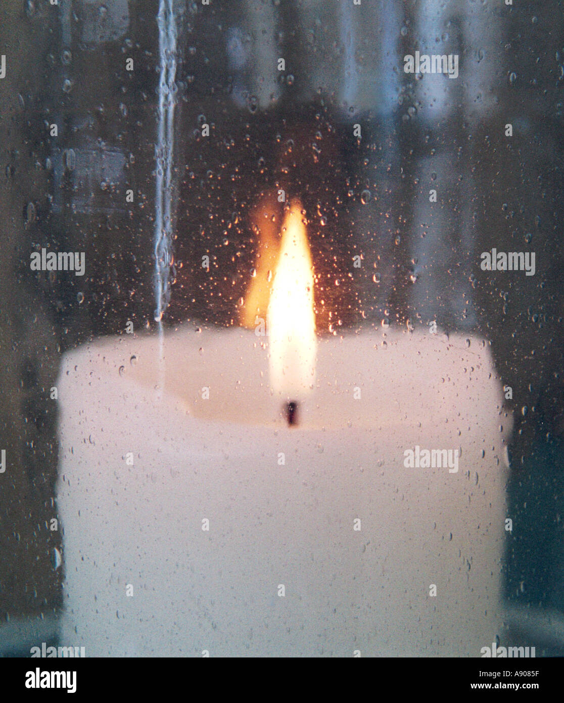 Diffused White Candle With Flame Stock Photo - Alamy