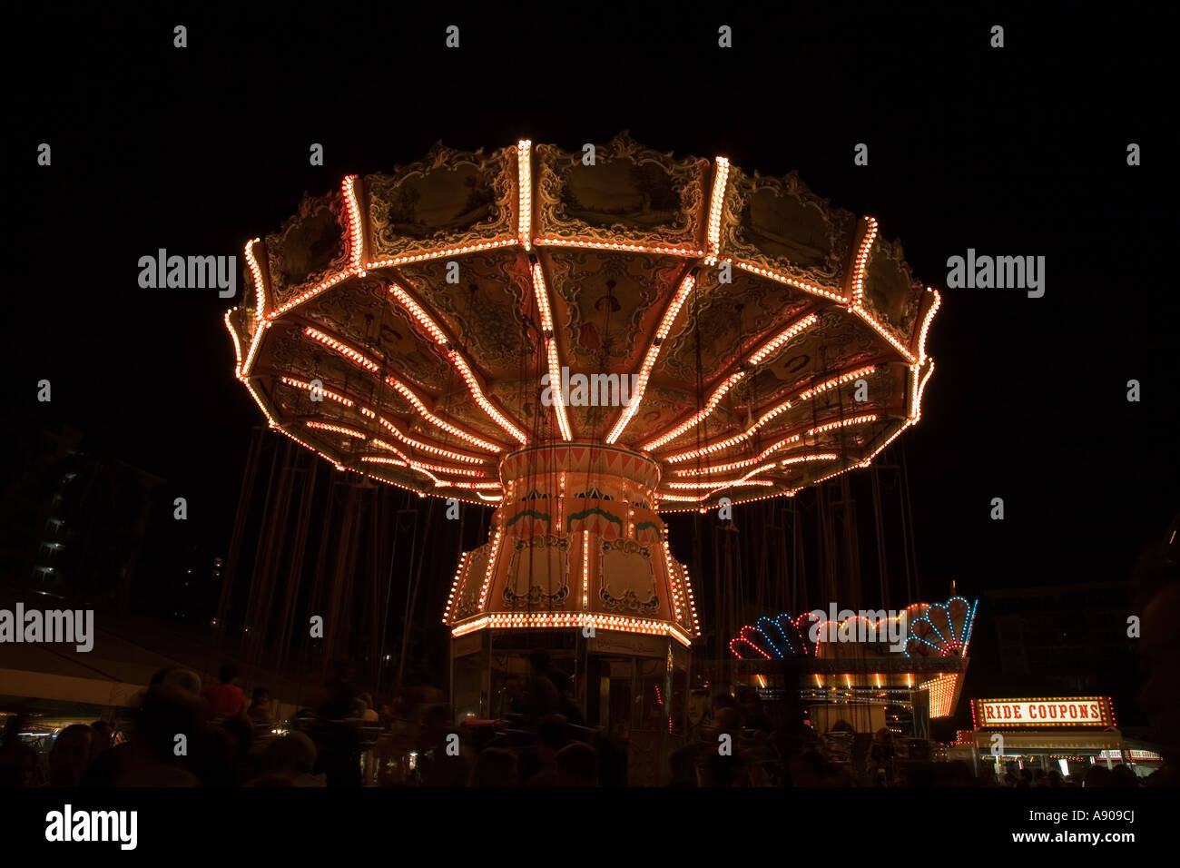 Carnival rides at night Stock Photo - Alamy