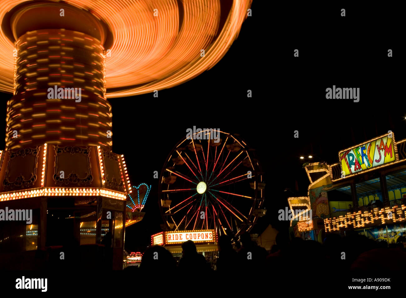 Carnival rides at night Stock Photo - Alamy