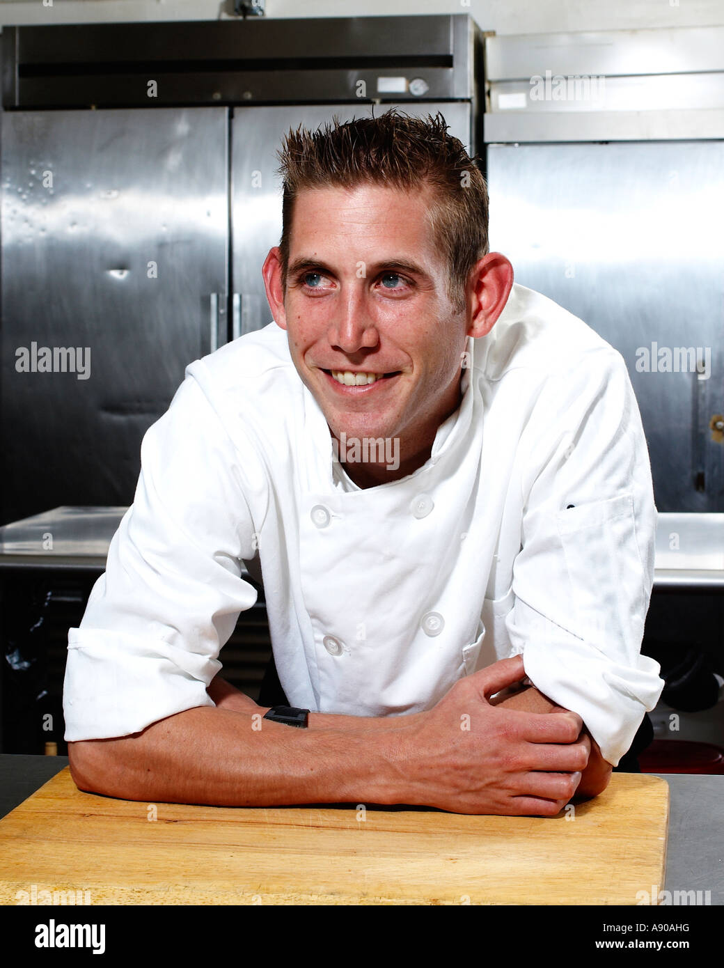Young chef in a kitchen Stock Photo - Alamy