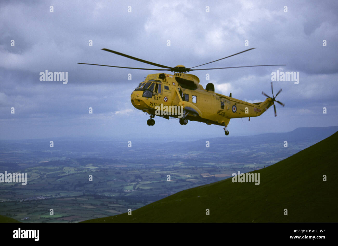 RAF RESCUE HELICOPTER Flying over Pen-y-fan, Brecon Beacons, South ...