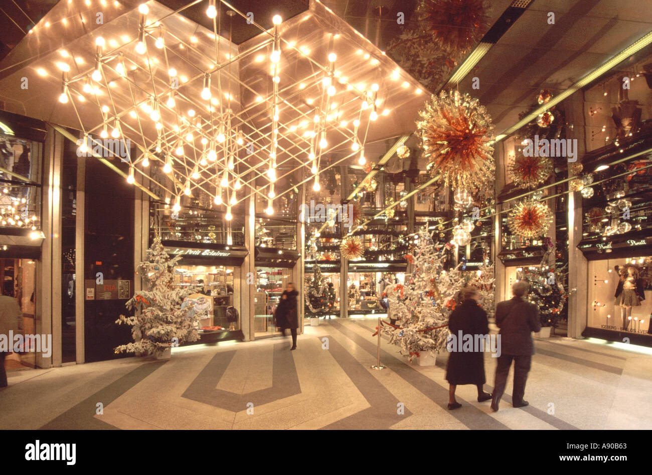 Paris people shopping interior French shop store arcade off the Champs ...