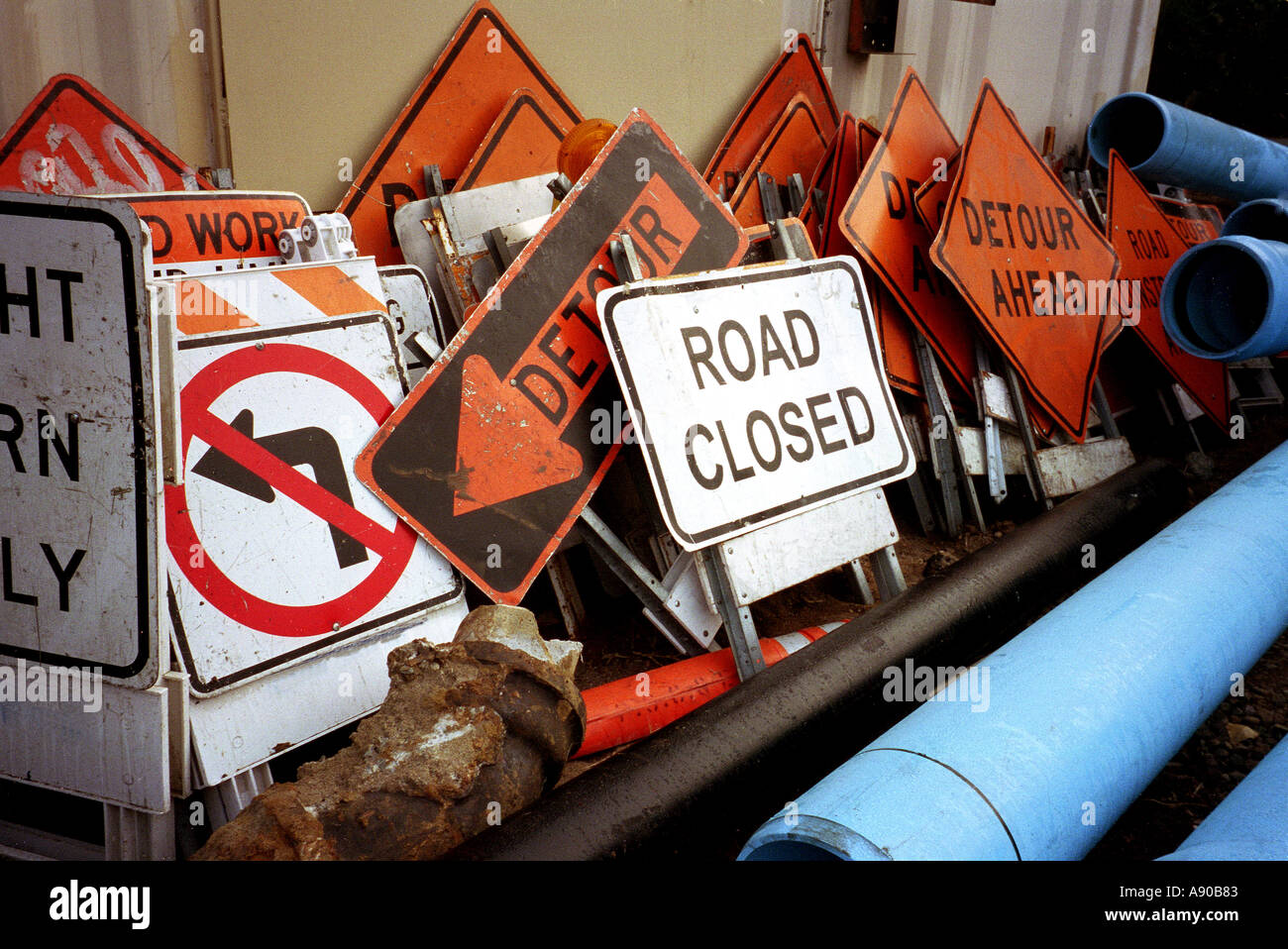 Piles of road directional signs Stock Photo - Alamy