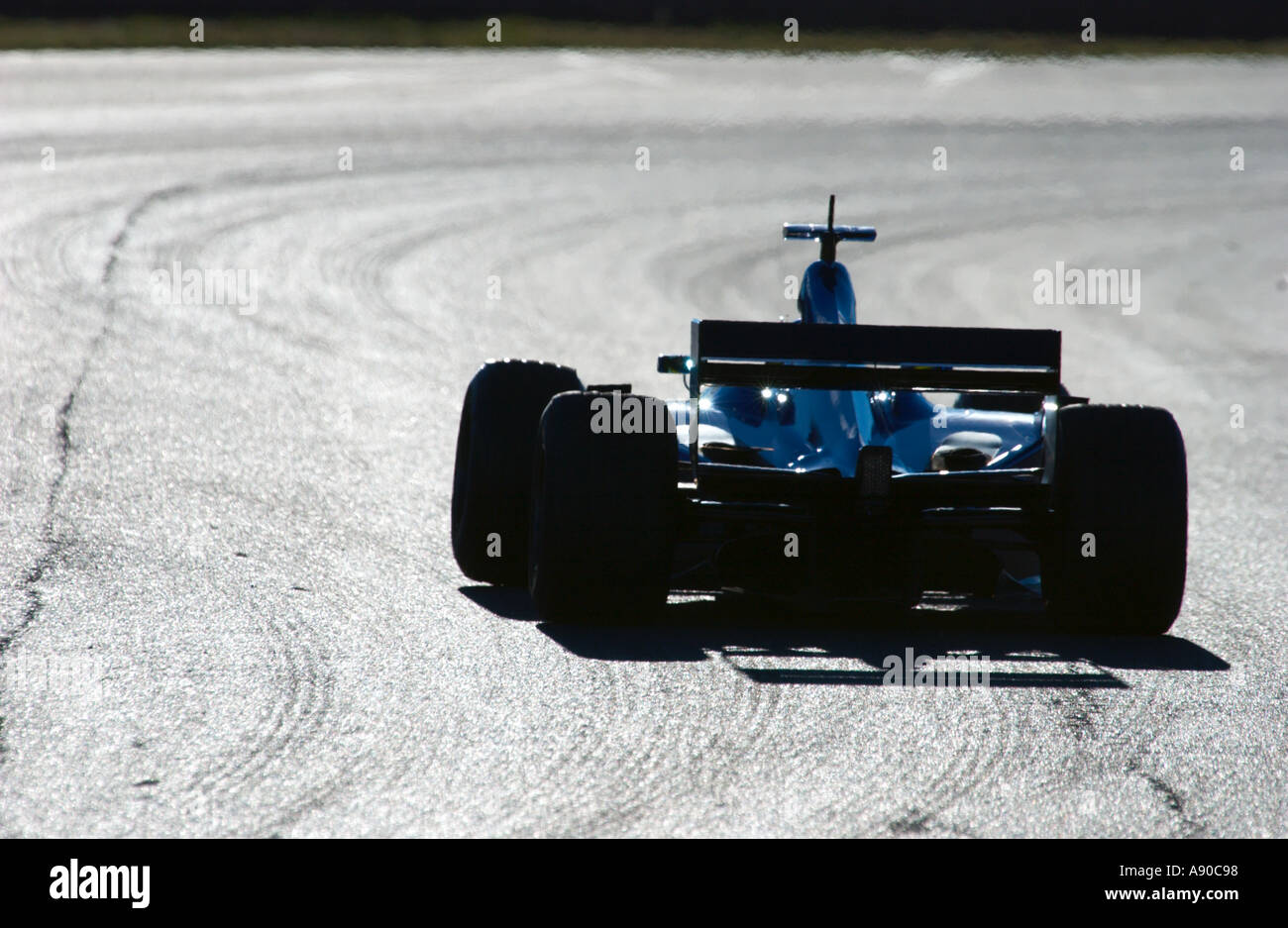 Formula One racing car speeding down the track Stock Photo - Alamy