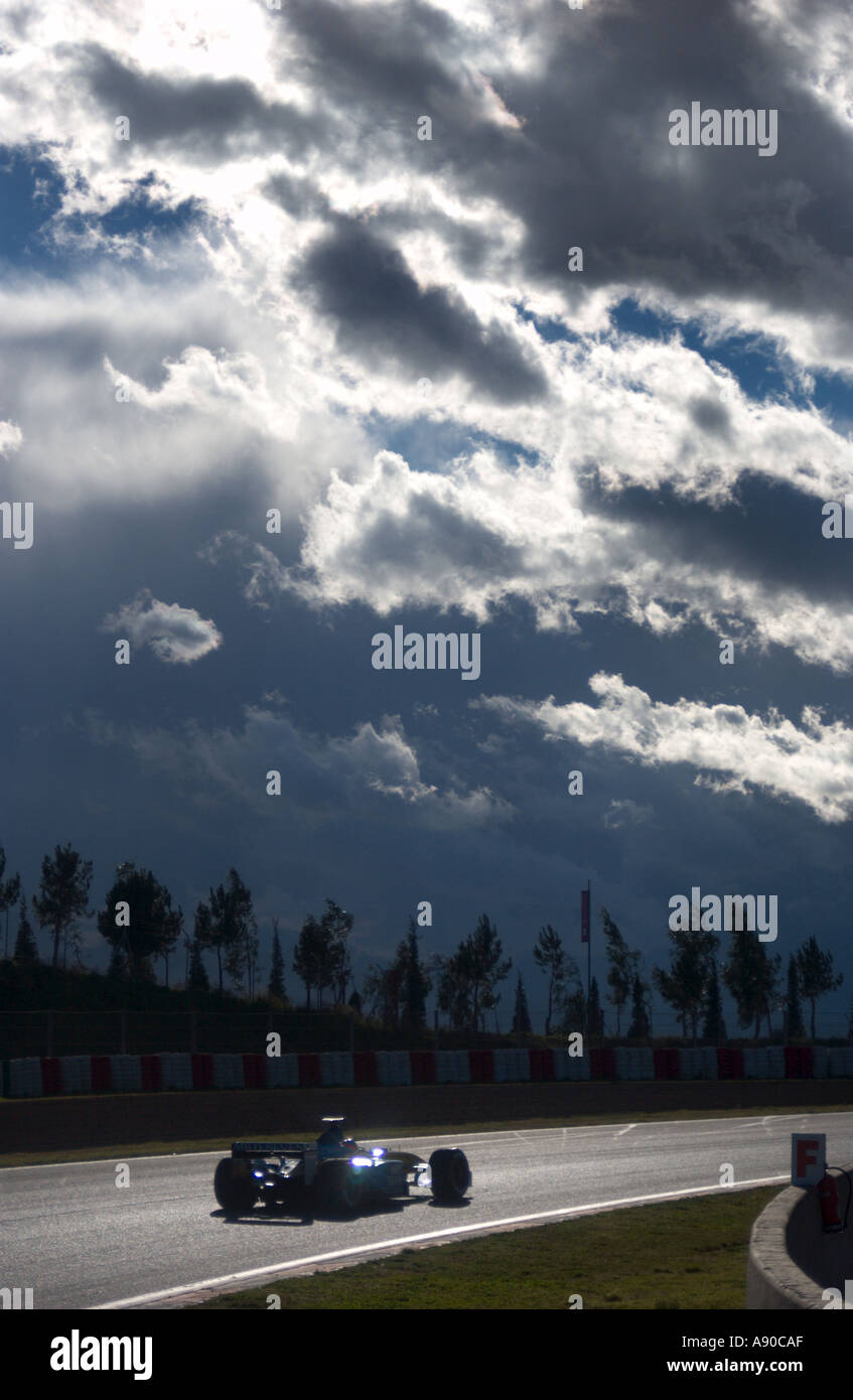 Formula One racing car speeding down the track Stock Photo - Alamy