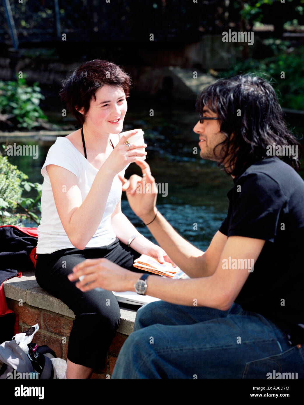 Friends chatting, summer day, discussing current affairs, dating, the ...