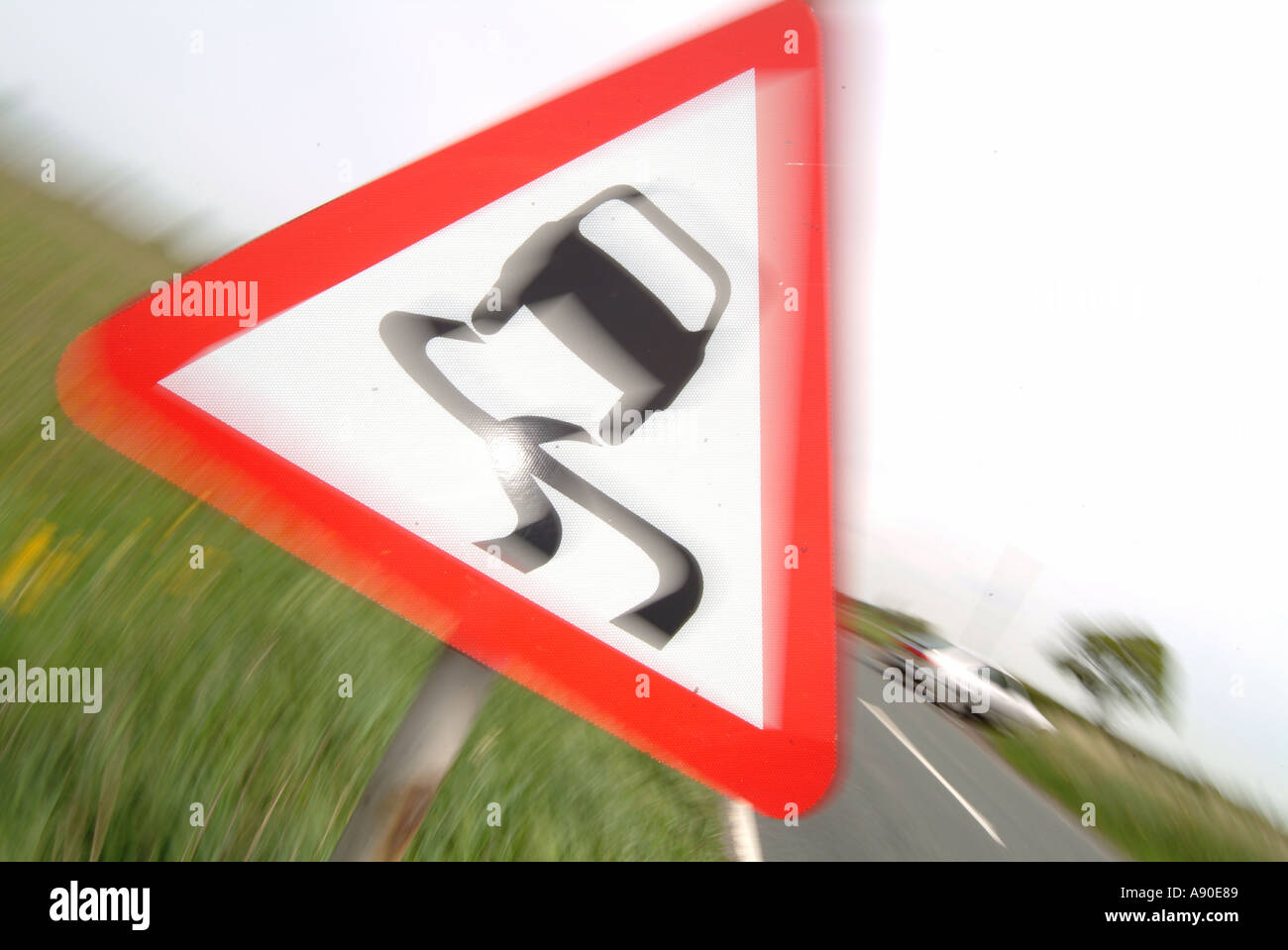road safety road sign slippery road crash car friction tyres concept ...