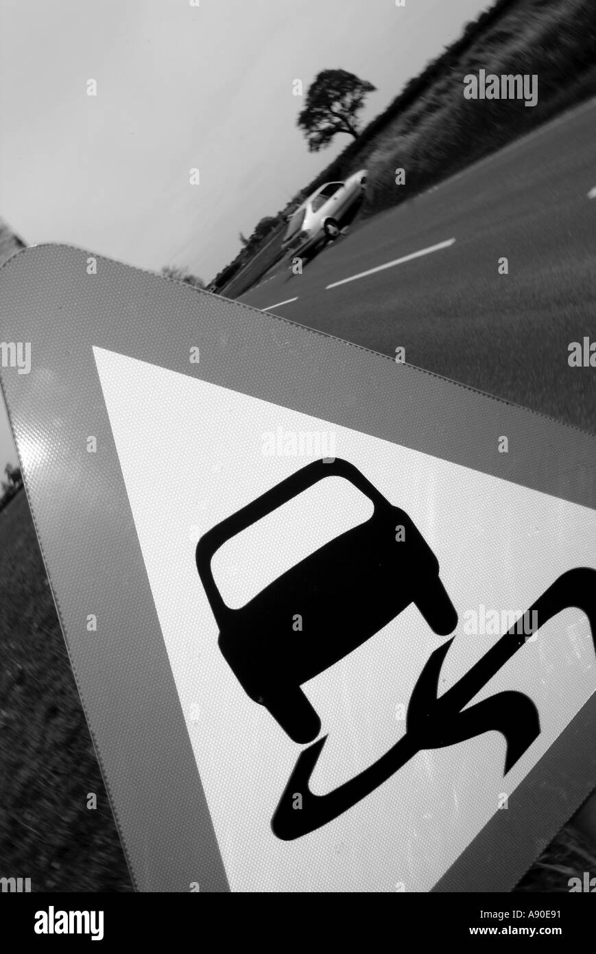 road safety road sign slippery road crash car friction tyres concept ...