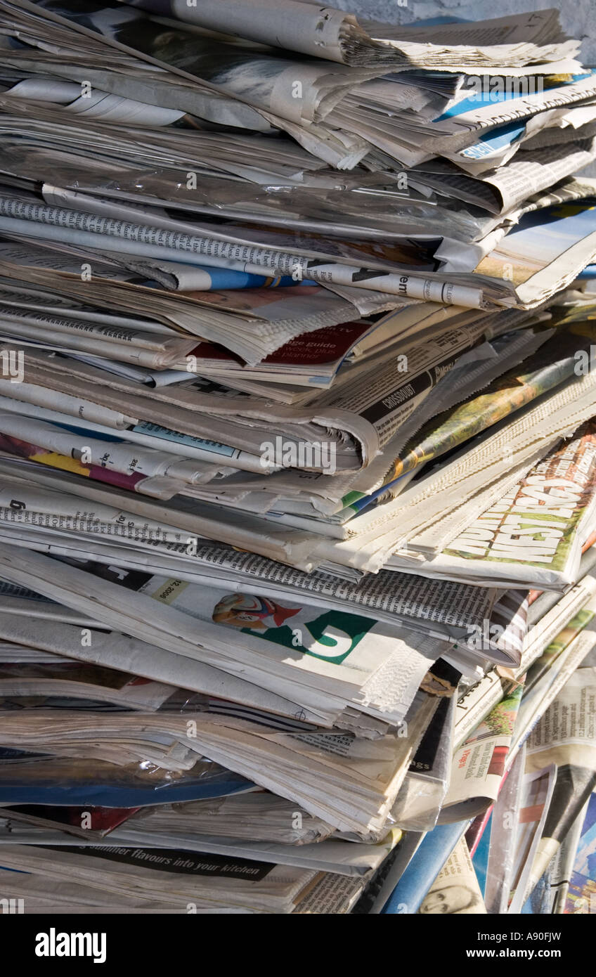 Stack of used newspapers Stock Photo - Alamy