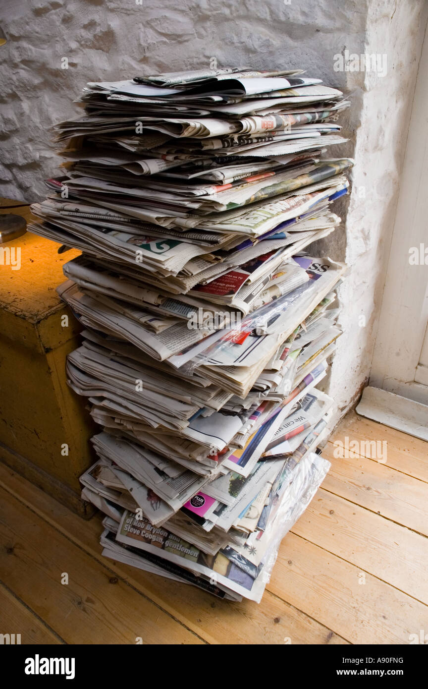 Stack of used newspapers Stock Photo - Alamy