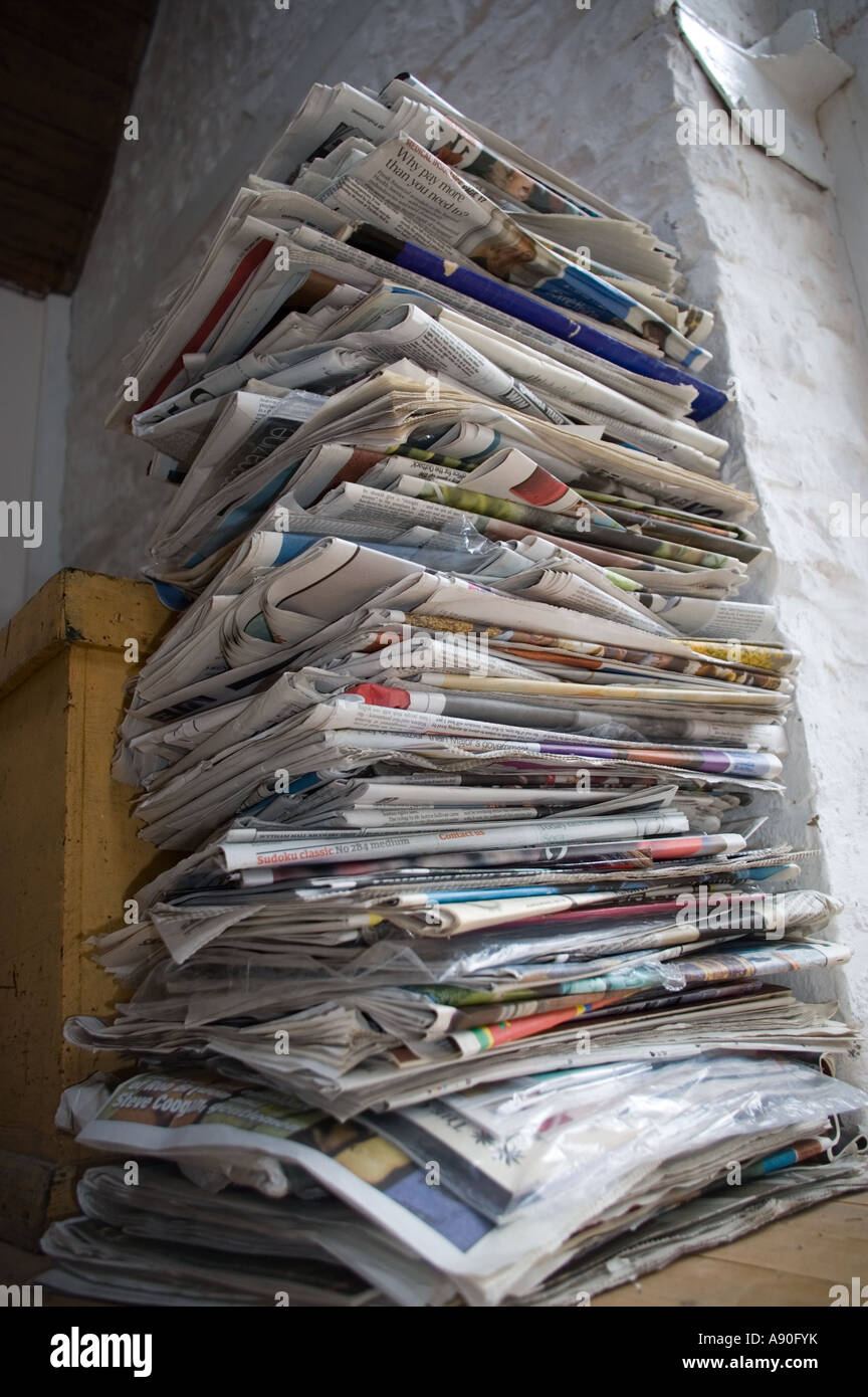 Stack of used newspapers Stock Photo - Alamy