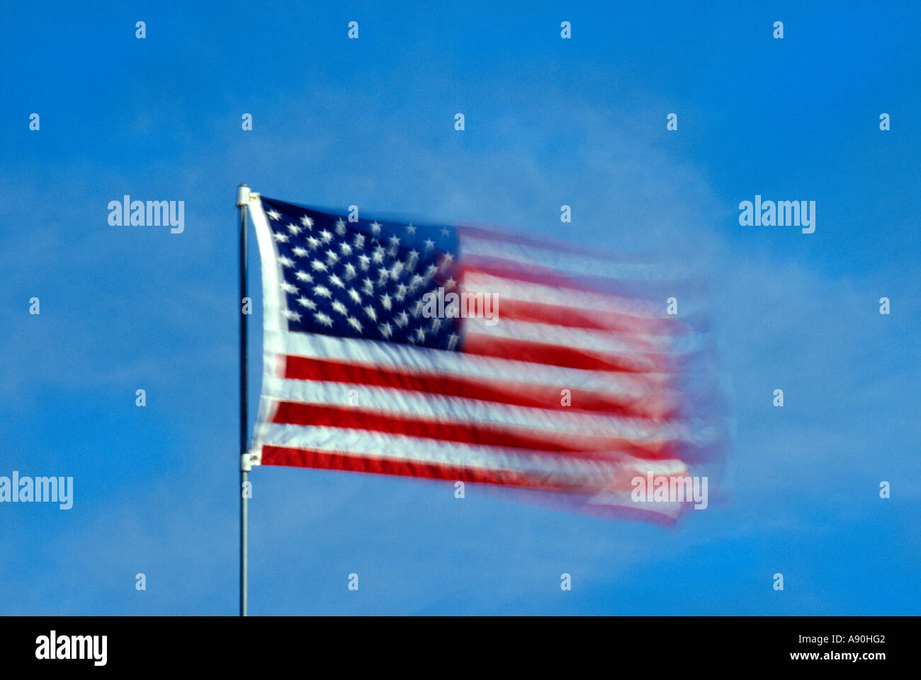 American flag waving in strong wind Stock Photo - Alamy